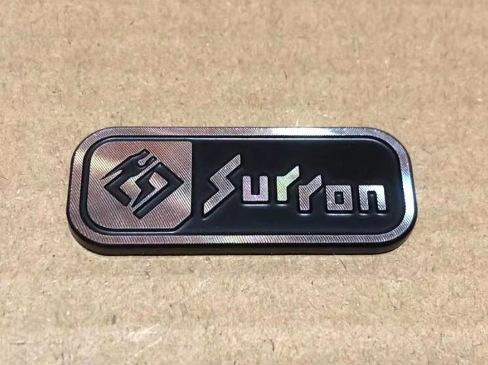 Surron Logo Badge